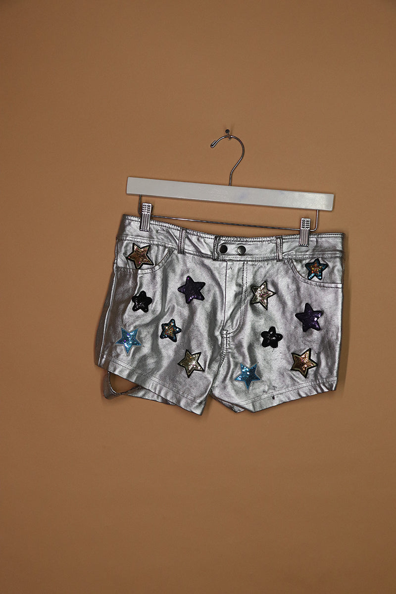Sample#02517- Metallic Cutout Chaps Star Patch Hot Shorts-L – Marek+Richard